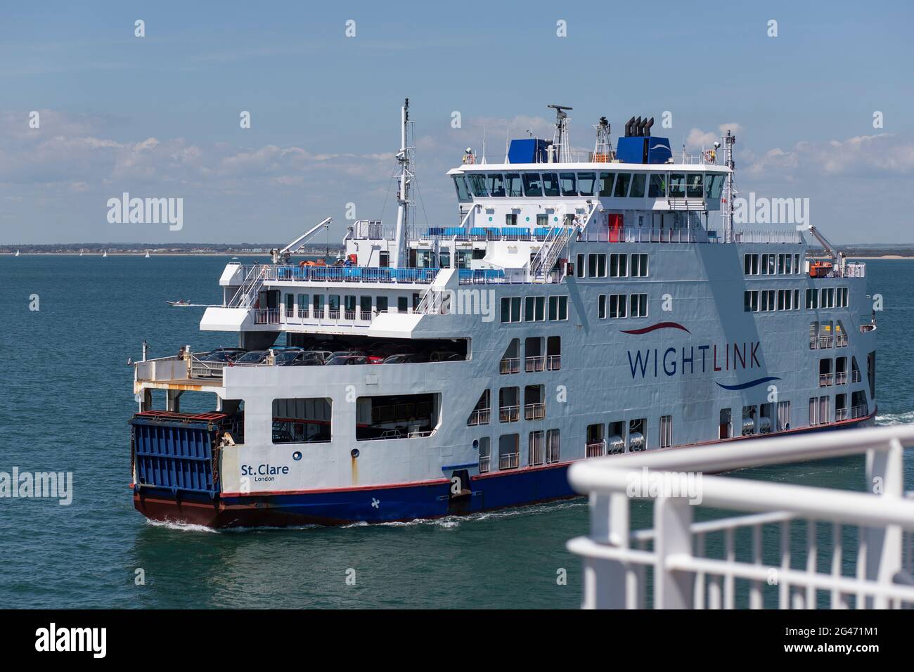 A Wight Link passenger / car ferry, en route in The Solent, between ...