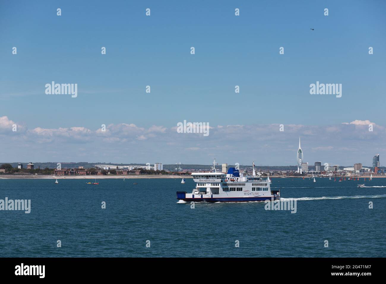 A Wight Link passenger / car ferry, en route in The Solent, between ...
