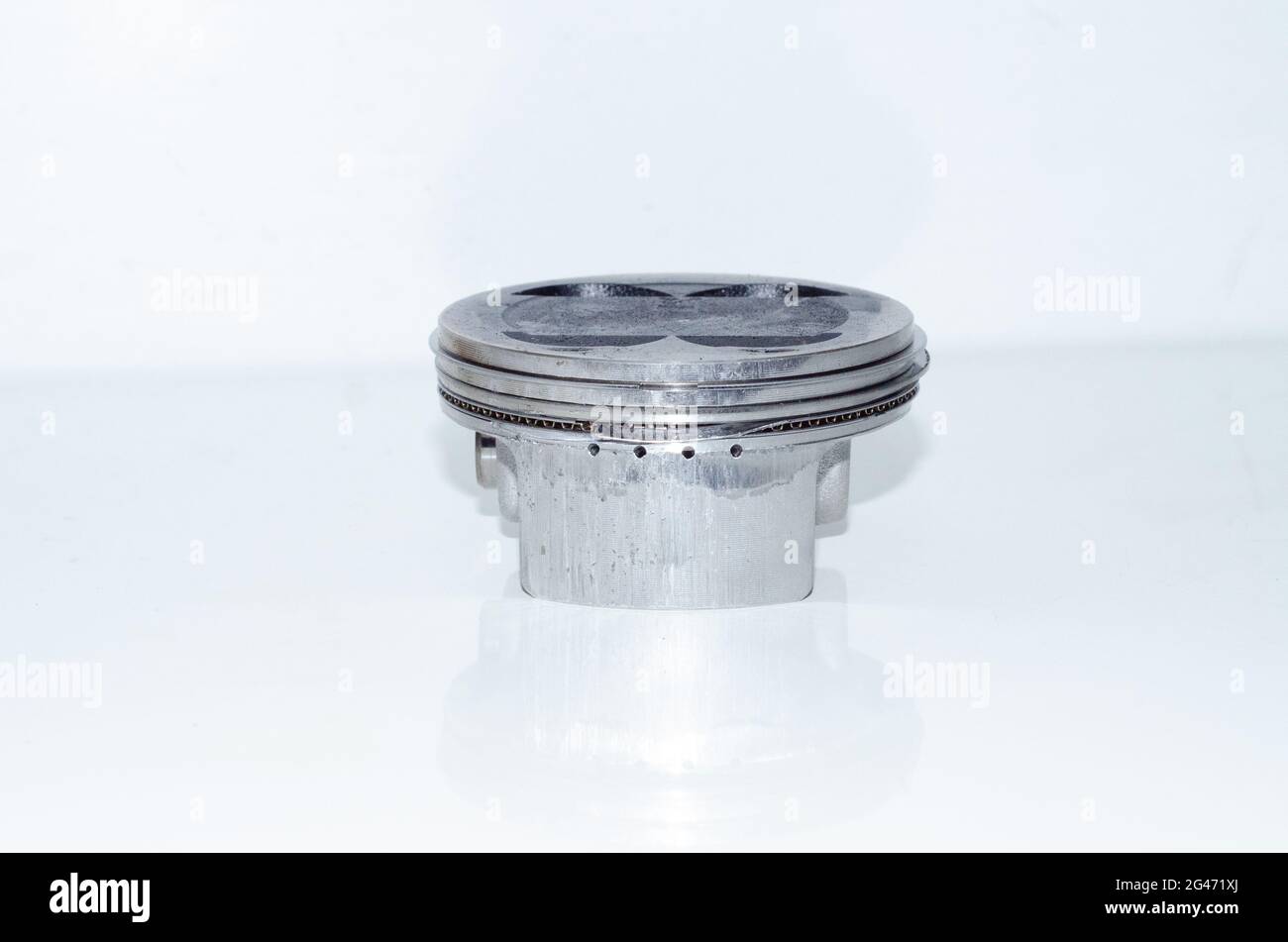 Closeup of piston ring damage with impact marks isolated on white ...