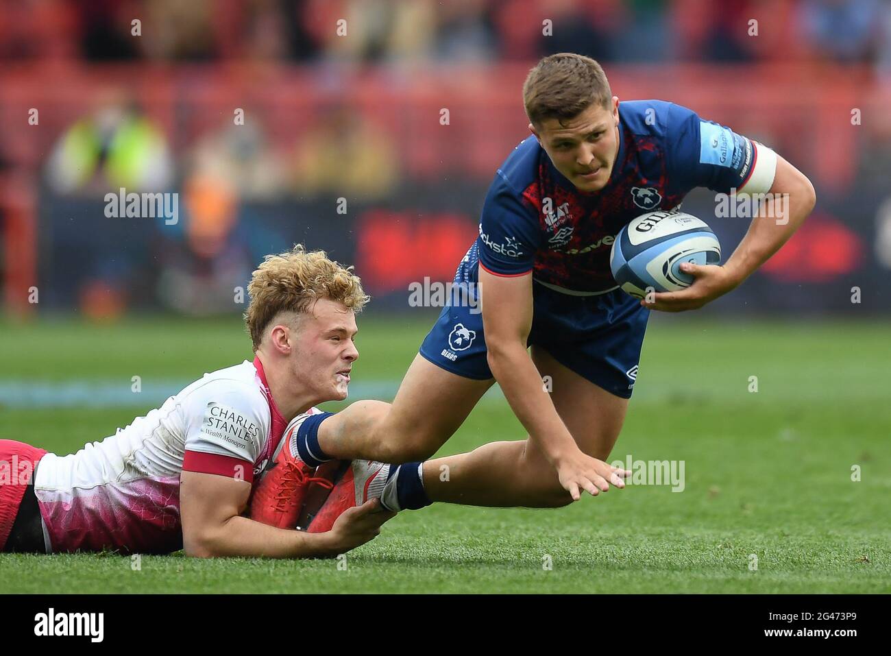 Callum Sheedy of Bristol Bears, tackled by Louis Lynagh of Harlequins ...