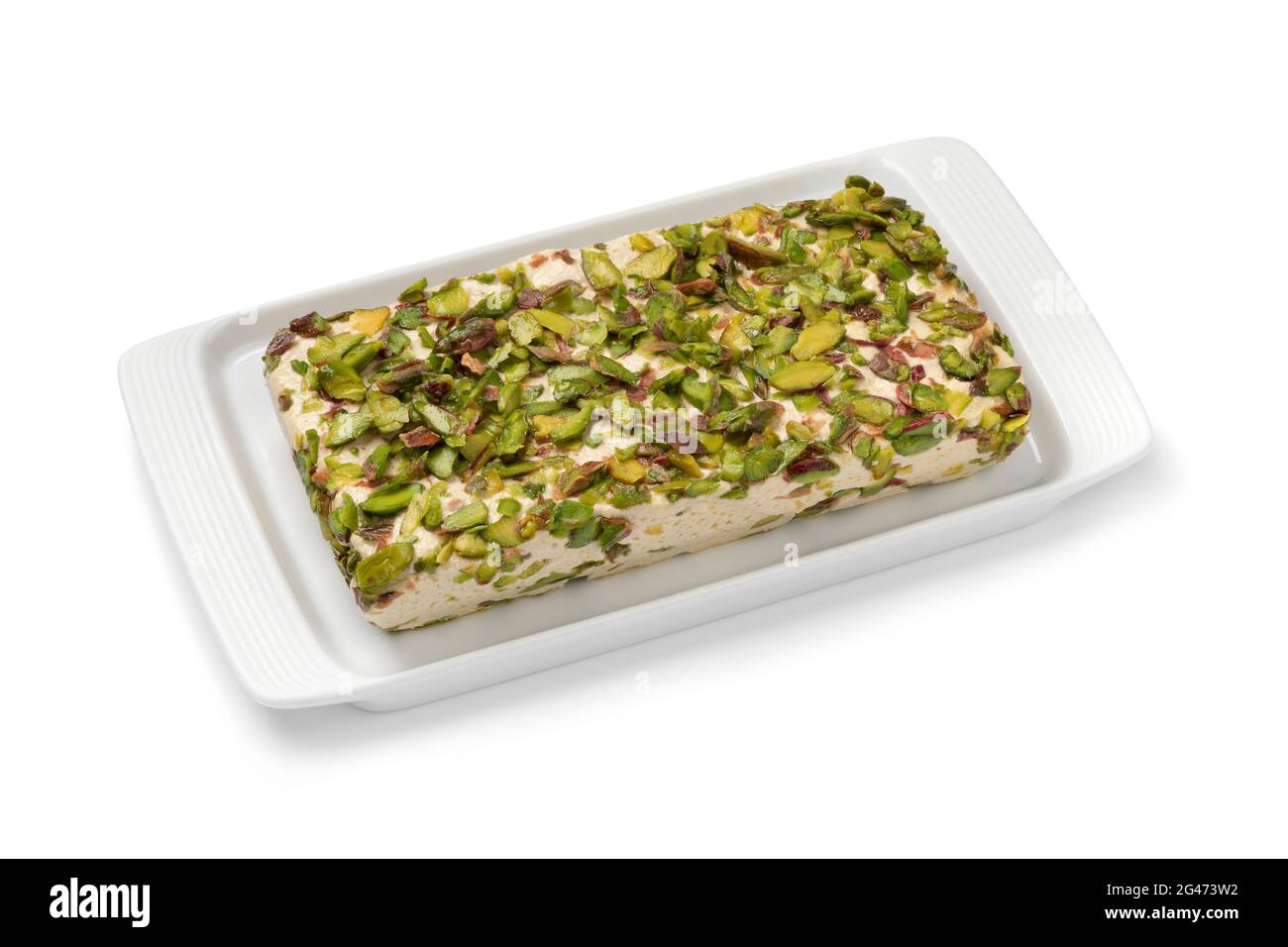 Plate with traditional Turkish pistachio halva on a plate close up ...