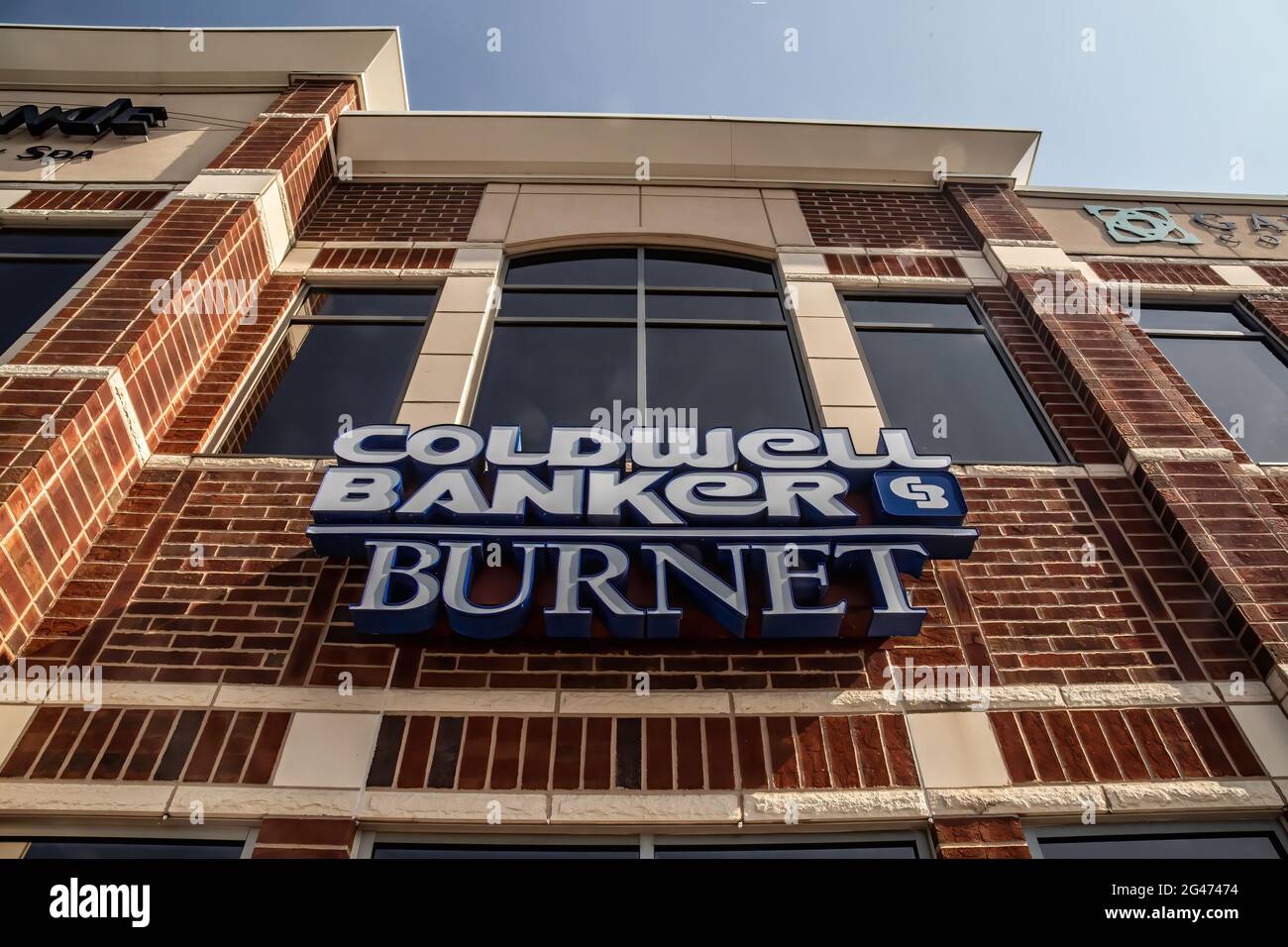 Coldwell Banker Burnet sign on an upscale office building at 1st St. SE ...