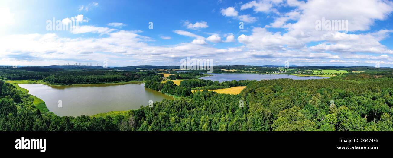 the westerwald forest with the dreifelder weiher lake in germany ...