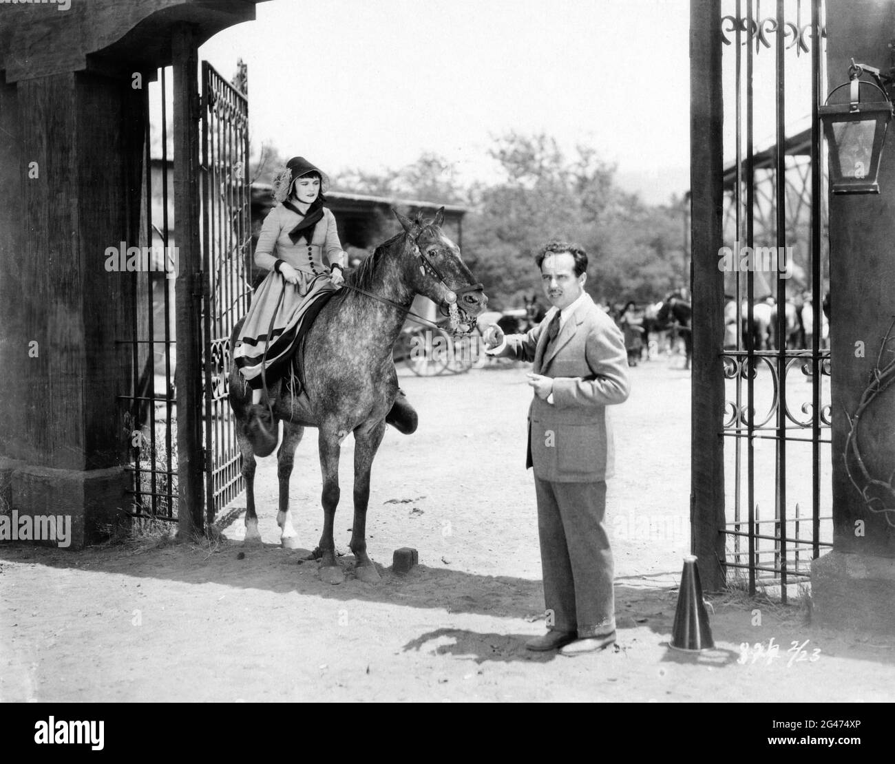 POLA NEGRI on set candid with Director PAUL BERN during filming of ...