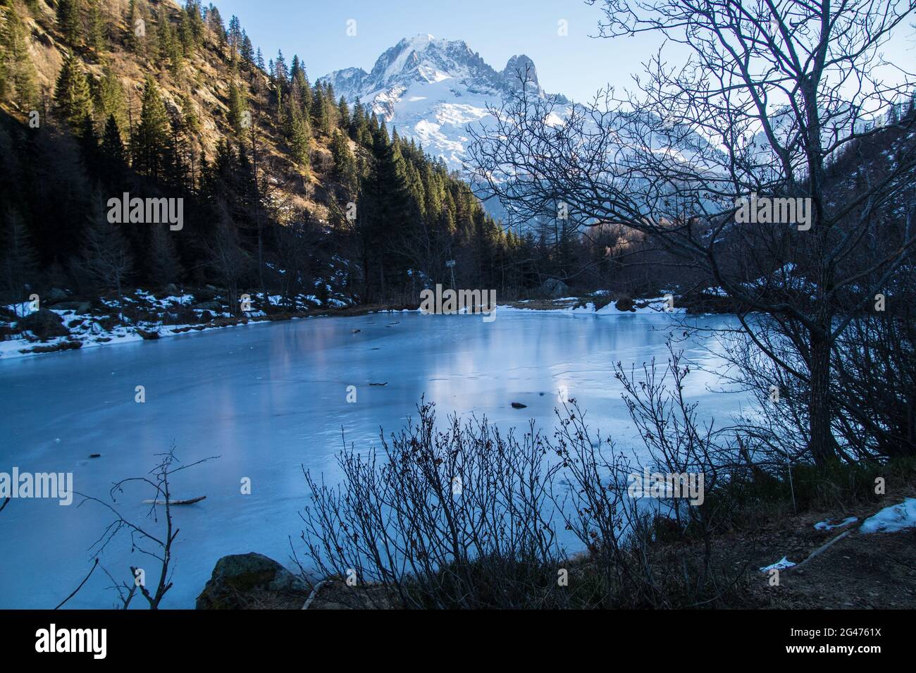 Frozen lake in the French alps Stock Photo - Alamy