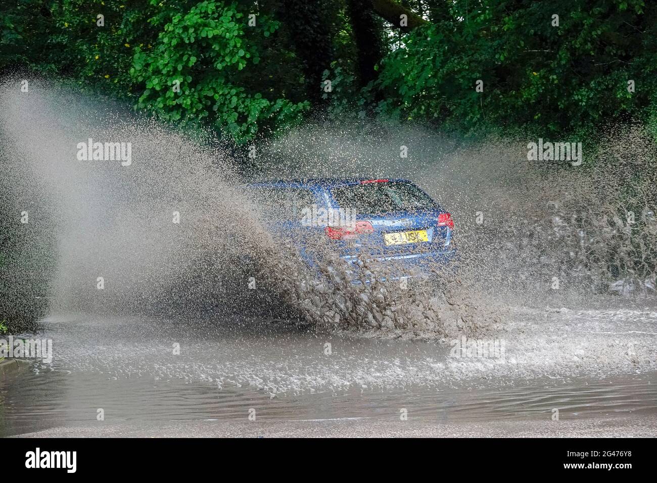 Speeding car in flood hi-res stock photography and images - Alamy