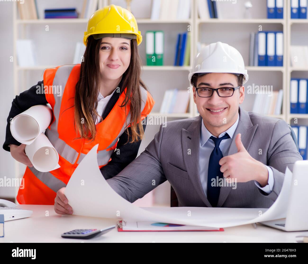 The construction foreman supervisor reviewing drawings Stock Photo - Alamy