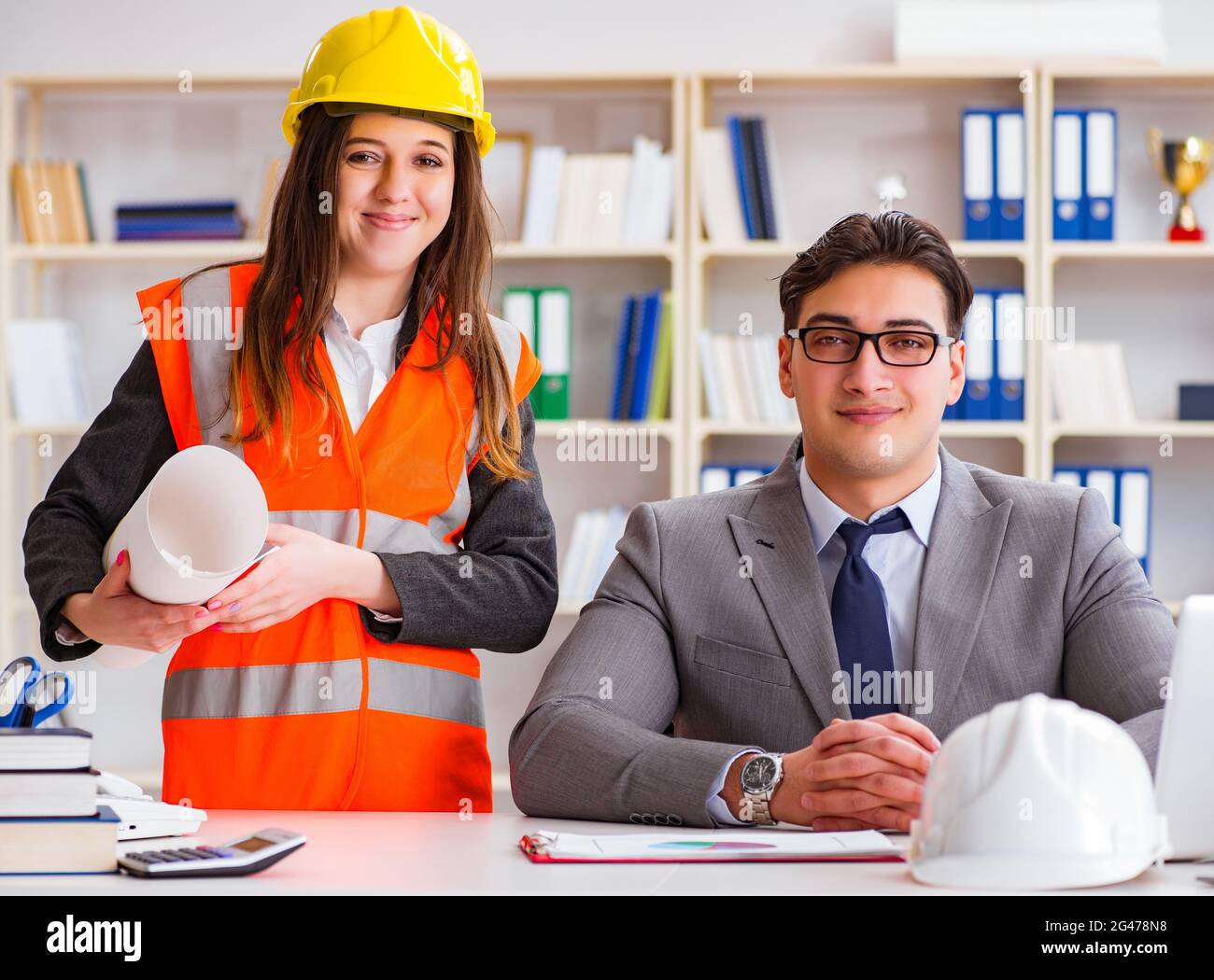 The construction foreman supervisor reviewing drawings Stock Photo - Alamy