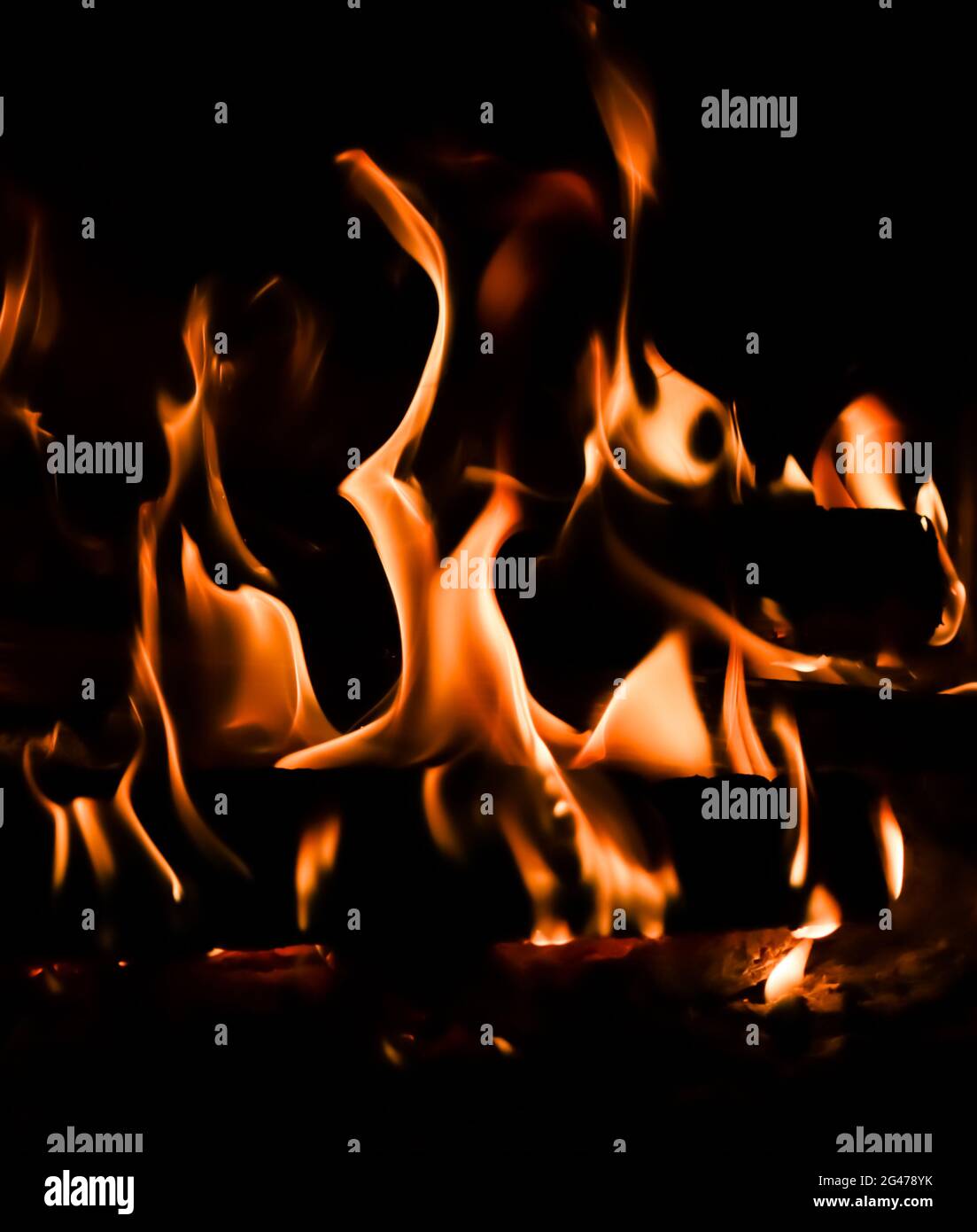 Red blaze Fire flame on a black background Stock Photo - Alamy