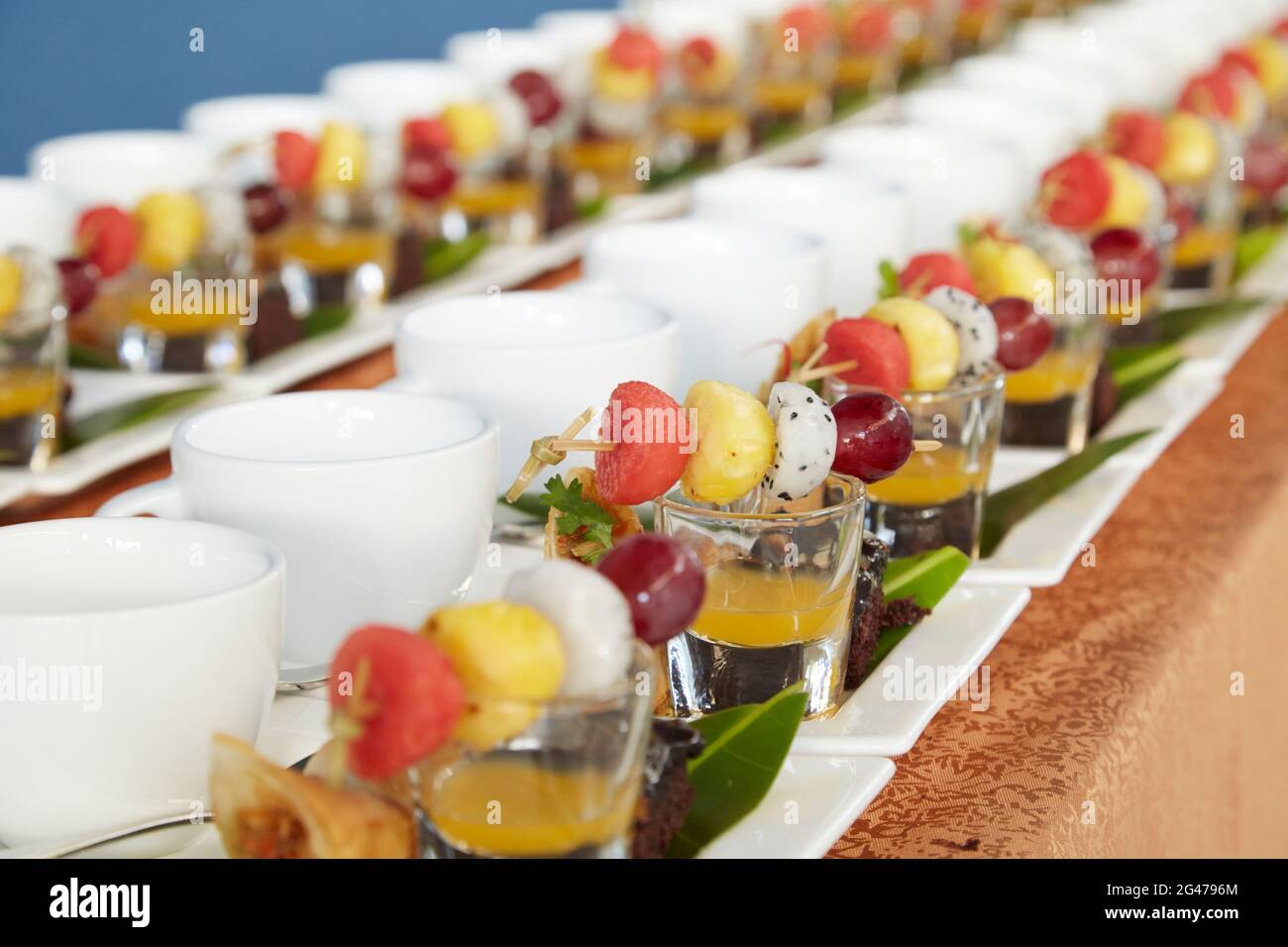 Coffee break with fruits and snacks Stock Photo - Alamy