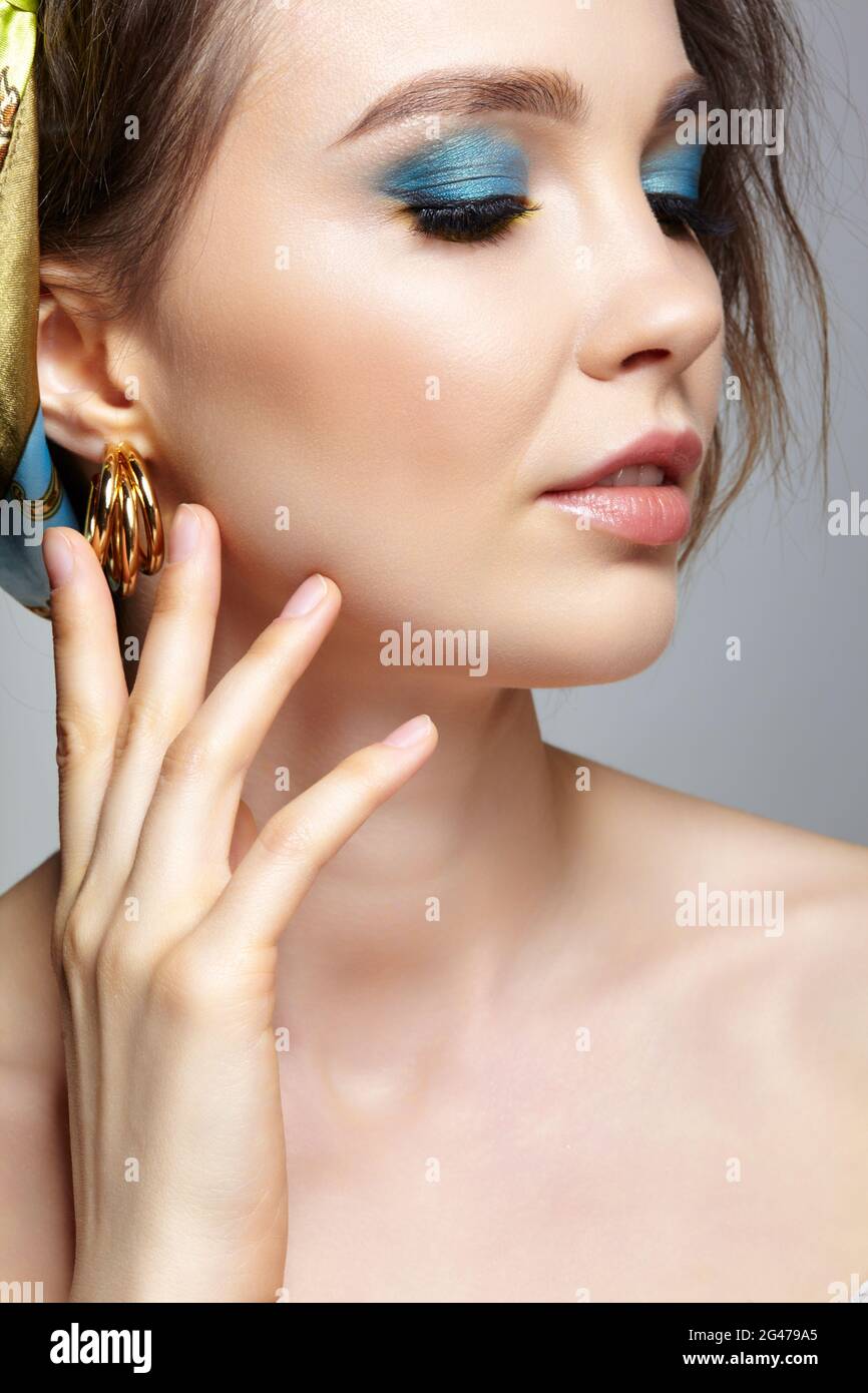 Female with closed eyes posing with hand near face Stock Photo - Alamy