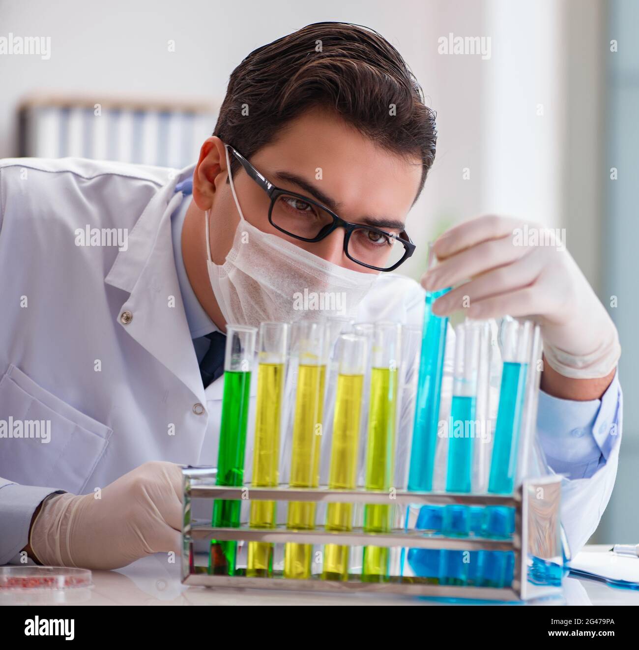 The doctor working in the lab Stock Photo - Alamy