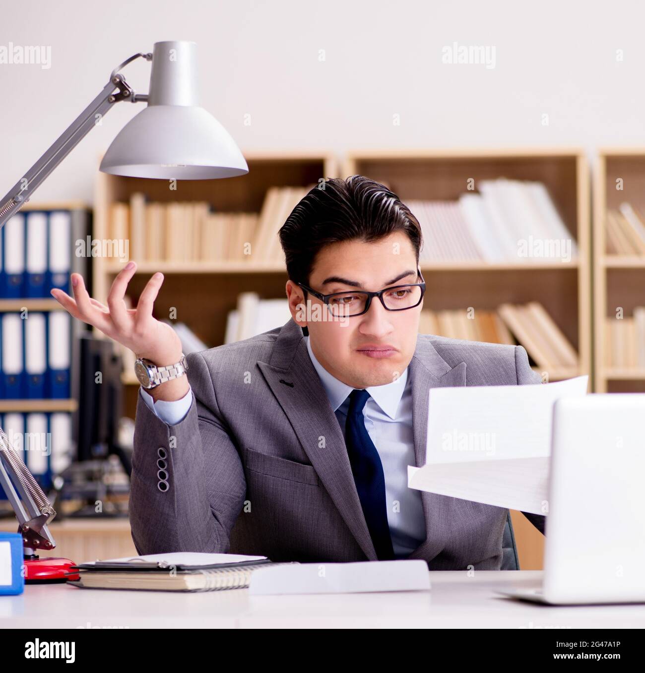 The businessman receiving letter envelope in office Stock Photo - Alamy
