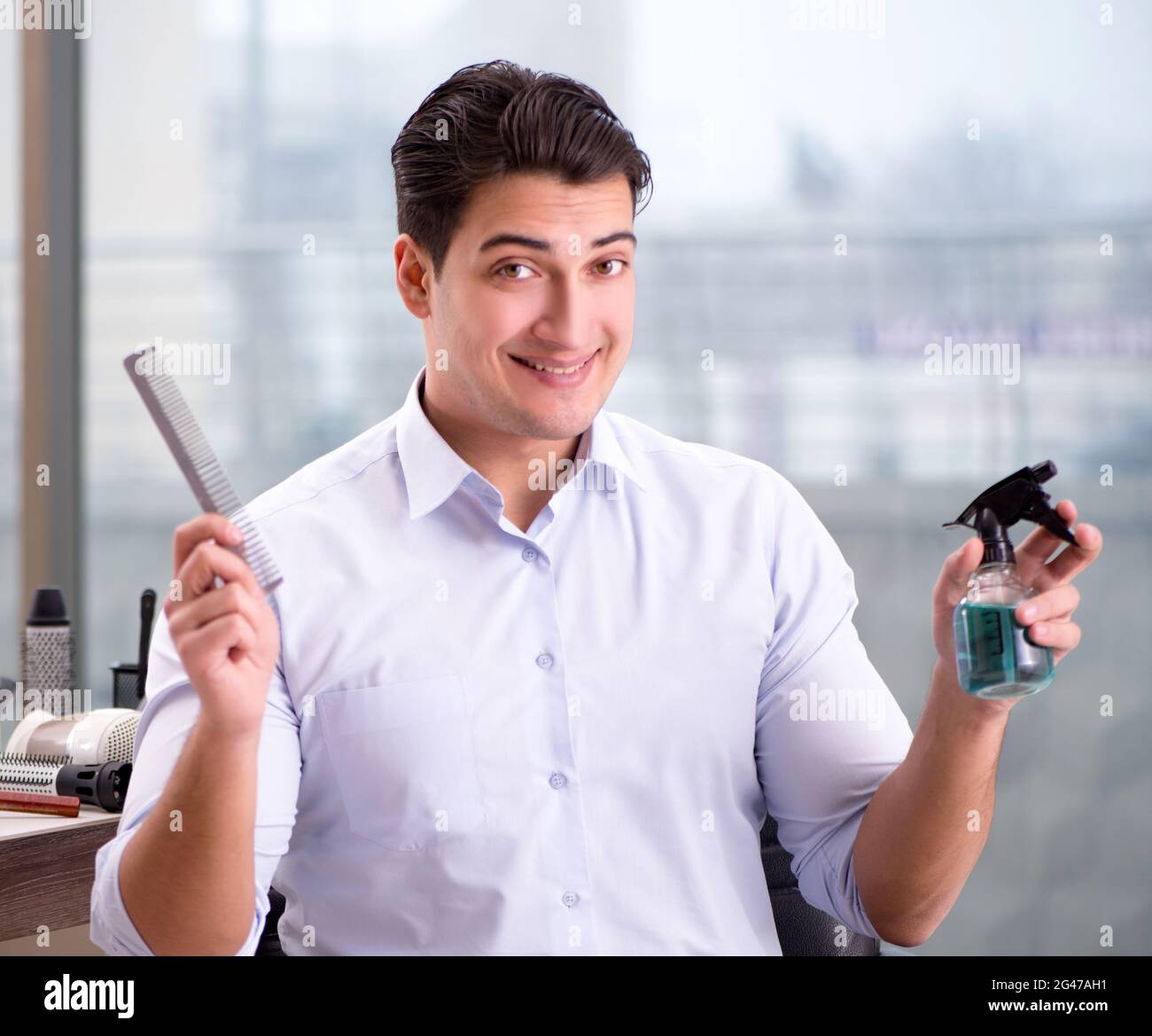 The handsome man in beauty salon Stock Photo - Alamy