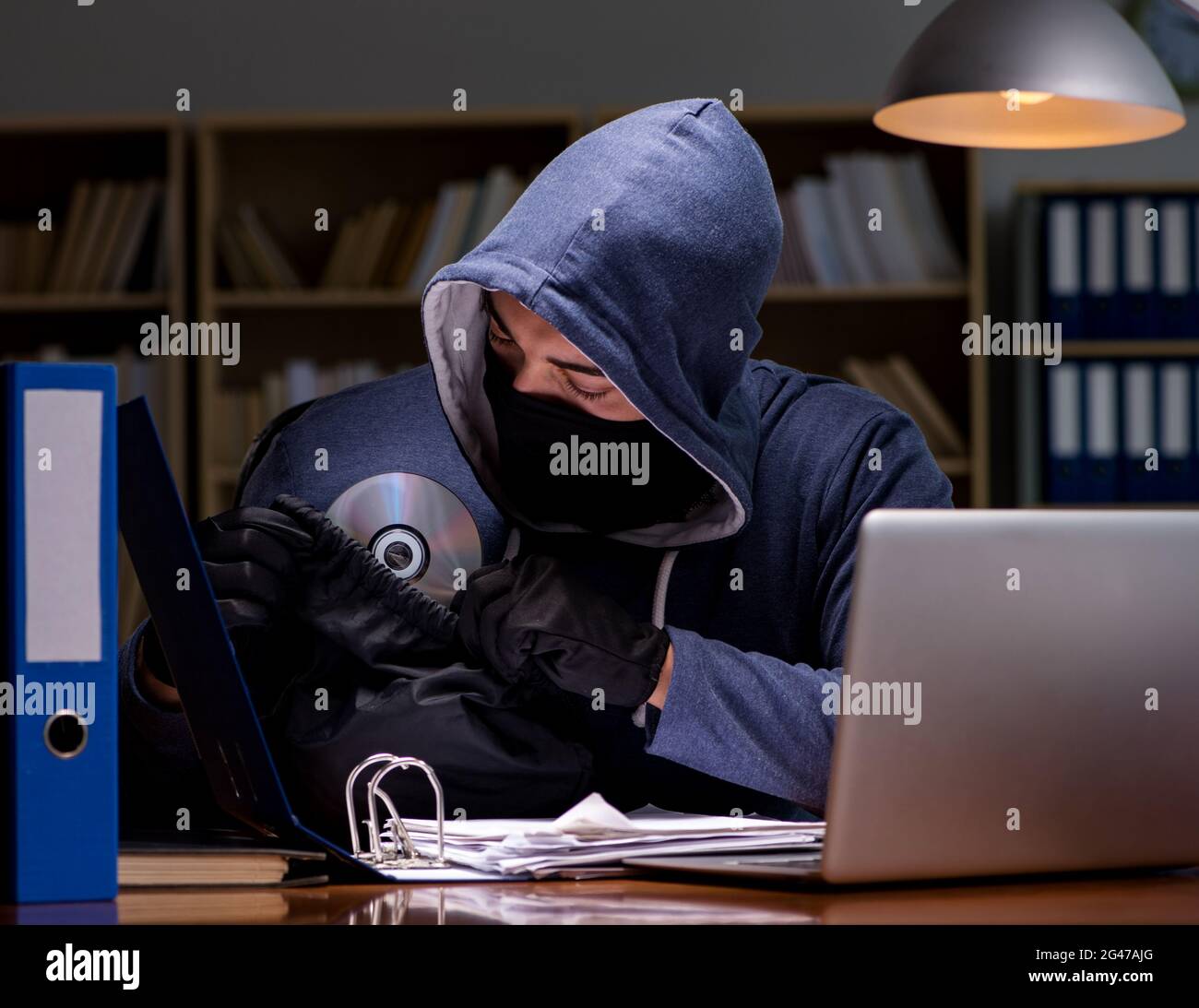 The hacker stealing personal data from home computer Stock Photo - Alamy