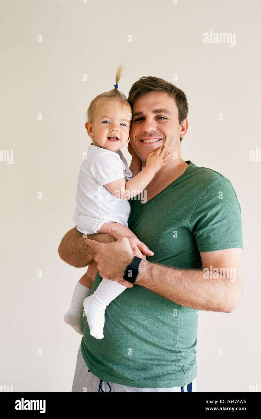 Hold baby in arms hi-res stock photography and images - Alamy