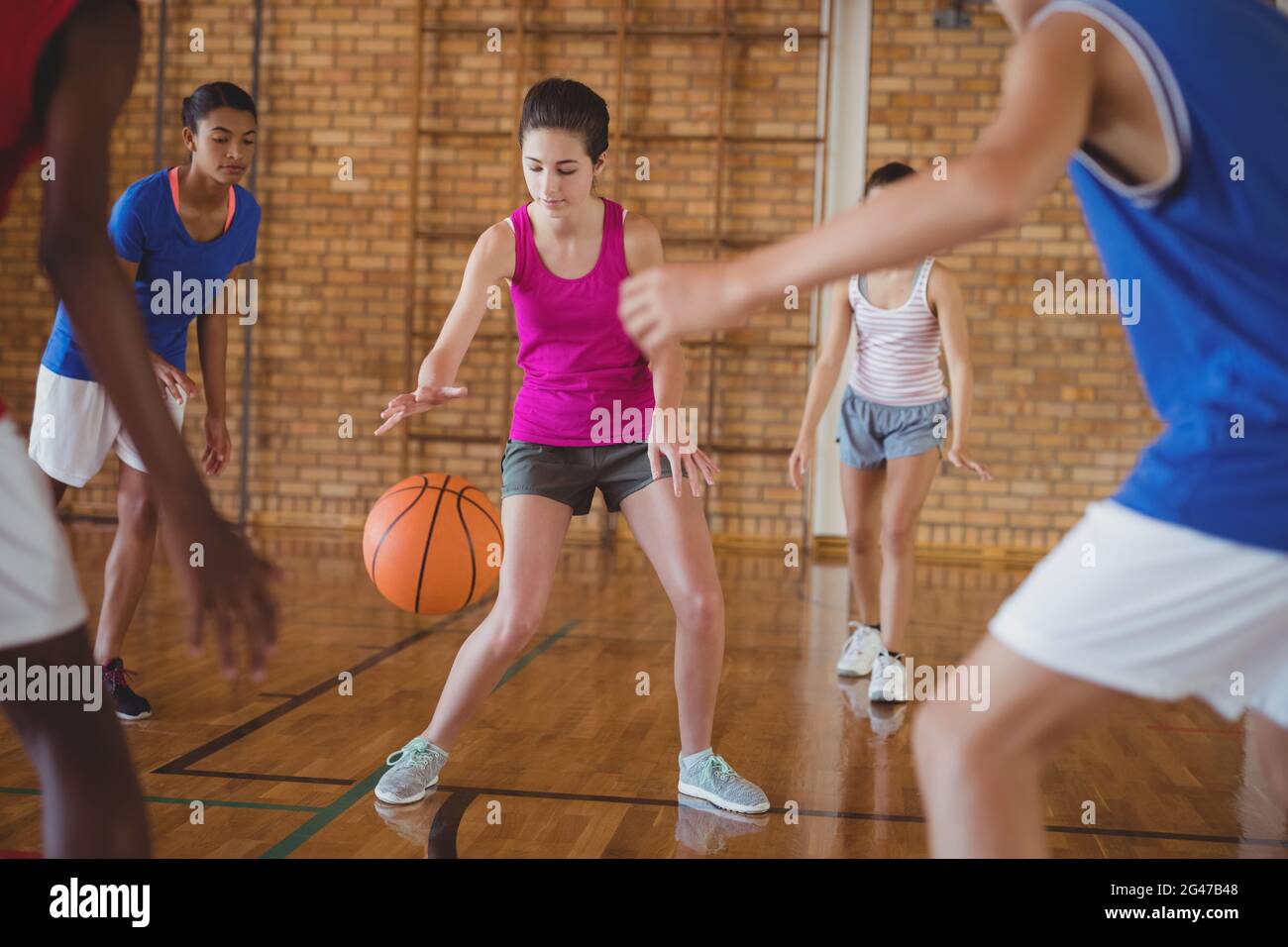 High school kids playing basketball in the court Stock Photo - Alamy