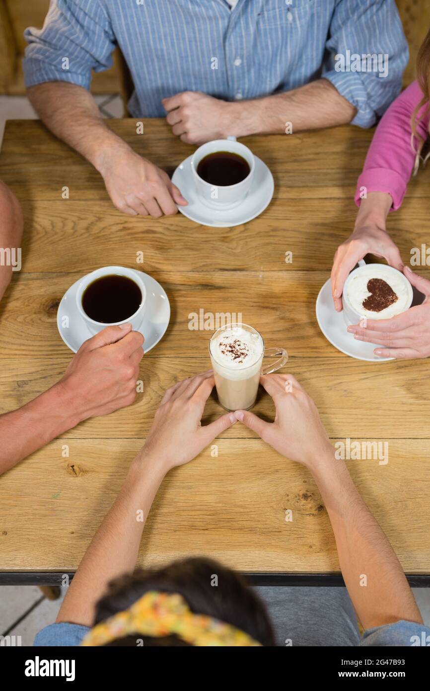 Friends having cup coffee hotel hi-res stock photography and images - Alamy