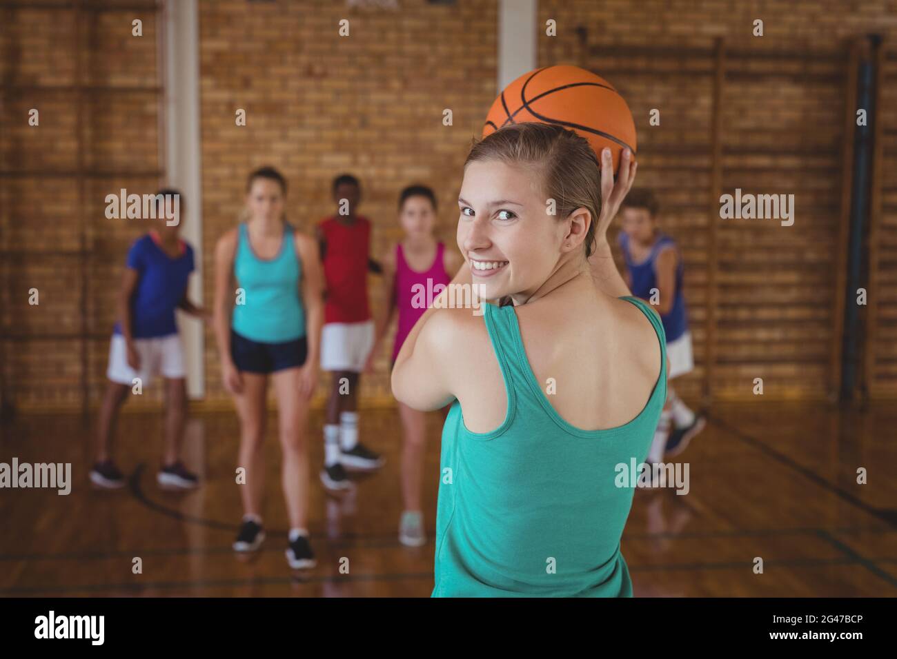 High school kids playing basketball in the court Stock Photo - Alamy