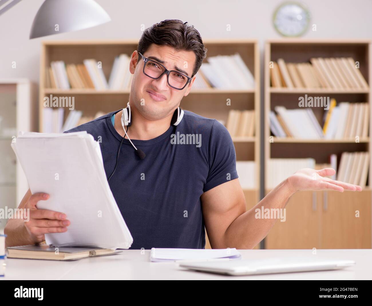 Unhappy teenager reading book hi-res stock photography and images - Alamy