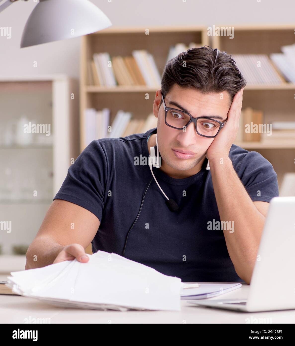 The angry man with too much paperwork to do Stock Photo - Alamy