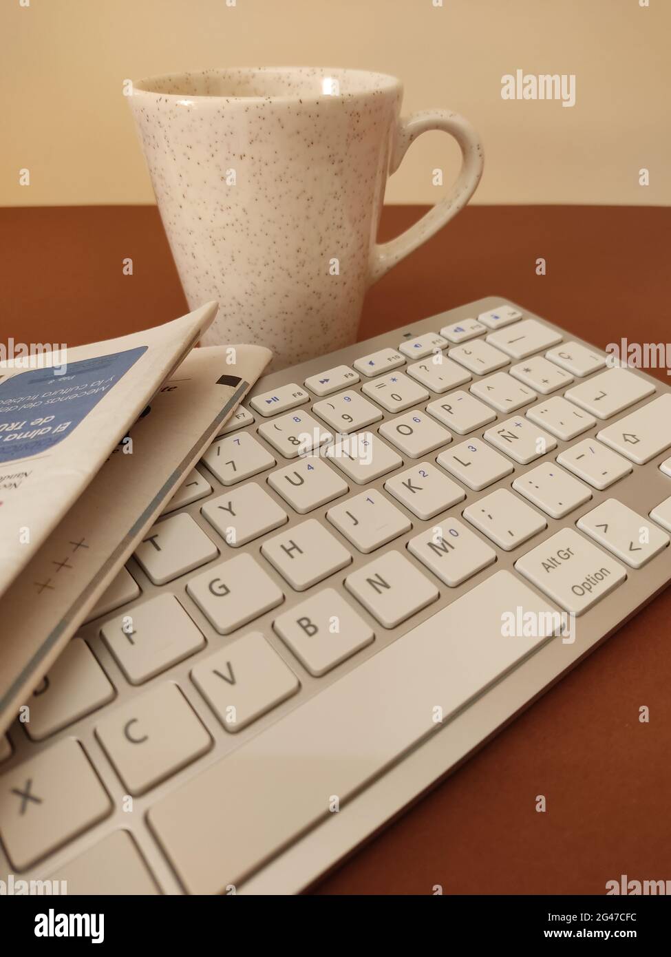 Coffee mug by the computer keyboard - working concept Stock Photo - Alamy