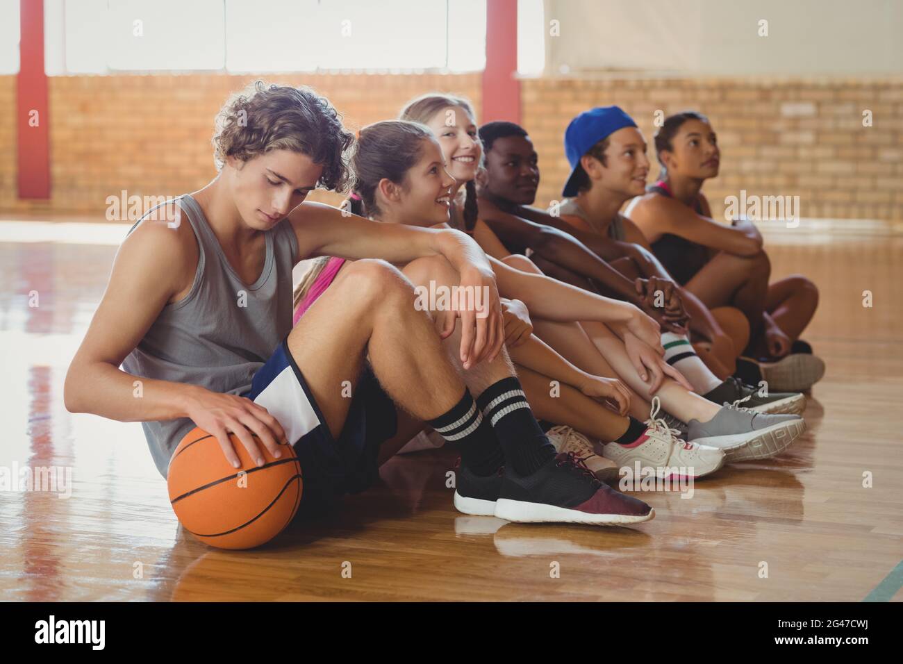 Boy basketball on floor hi-res stock photography and images - Alamy