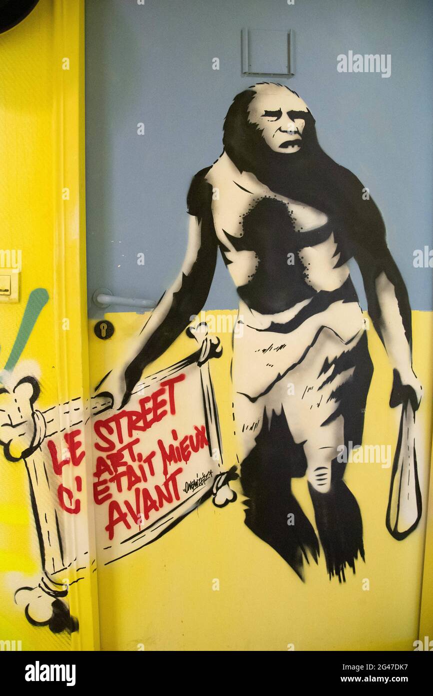 A piece of street art by artist One Mizer is seen in a building in ...