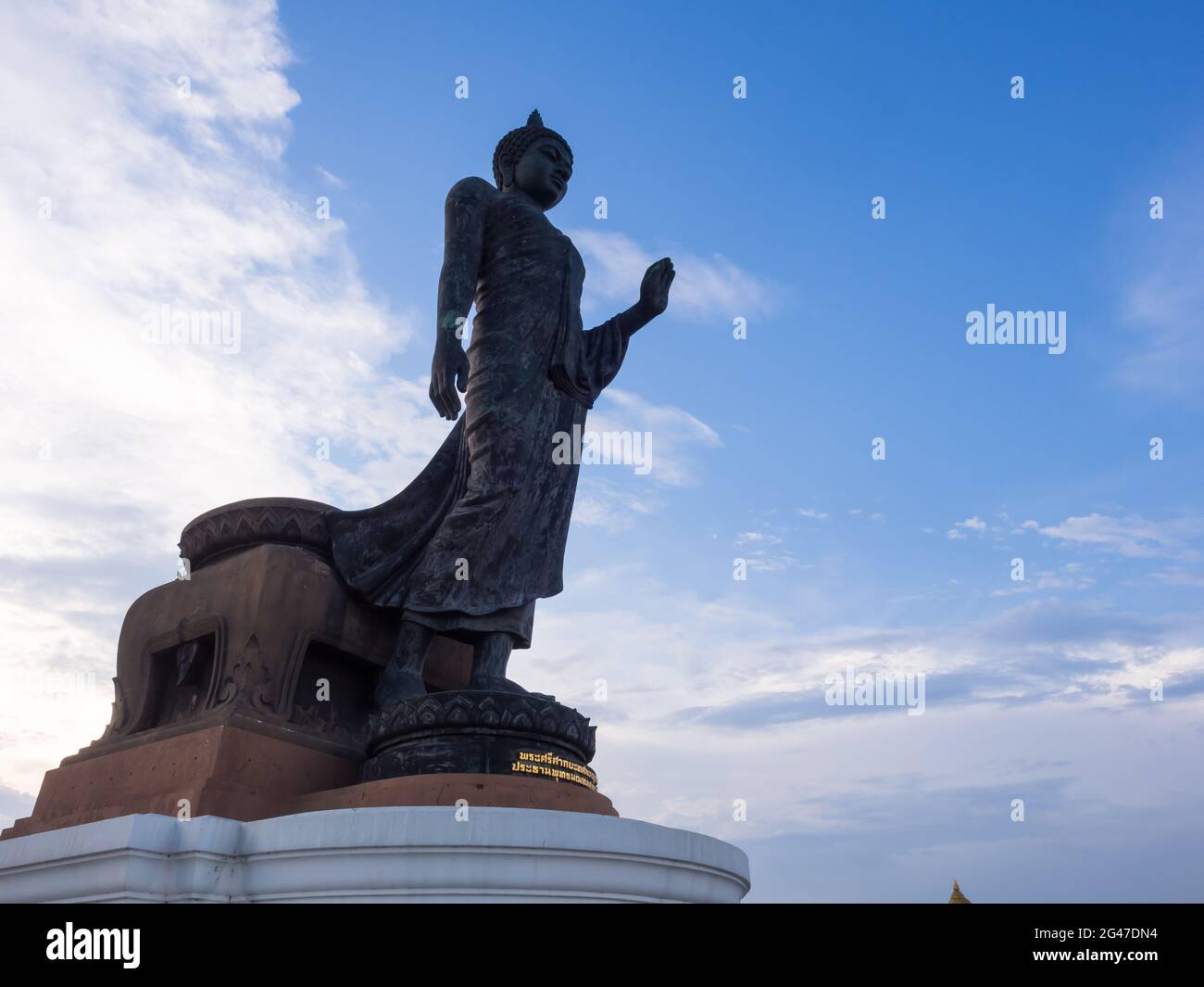 Grand walking buddha bronze statue is the major statue in ...