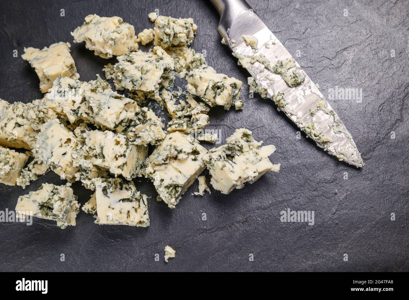 blue cheese diced close-up. food cheese Stock Photo - Alamy