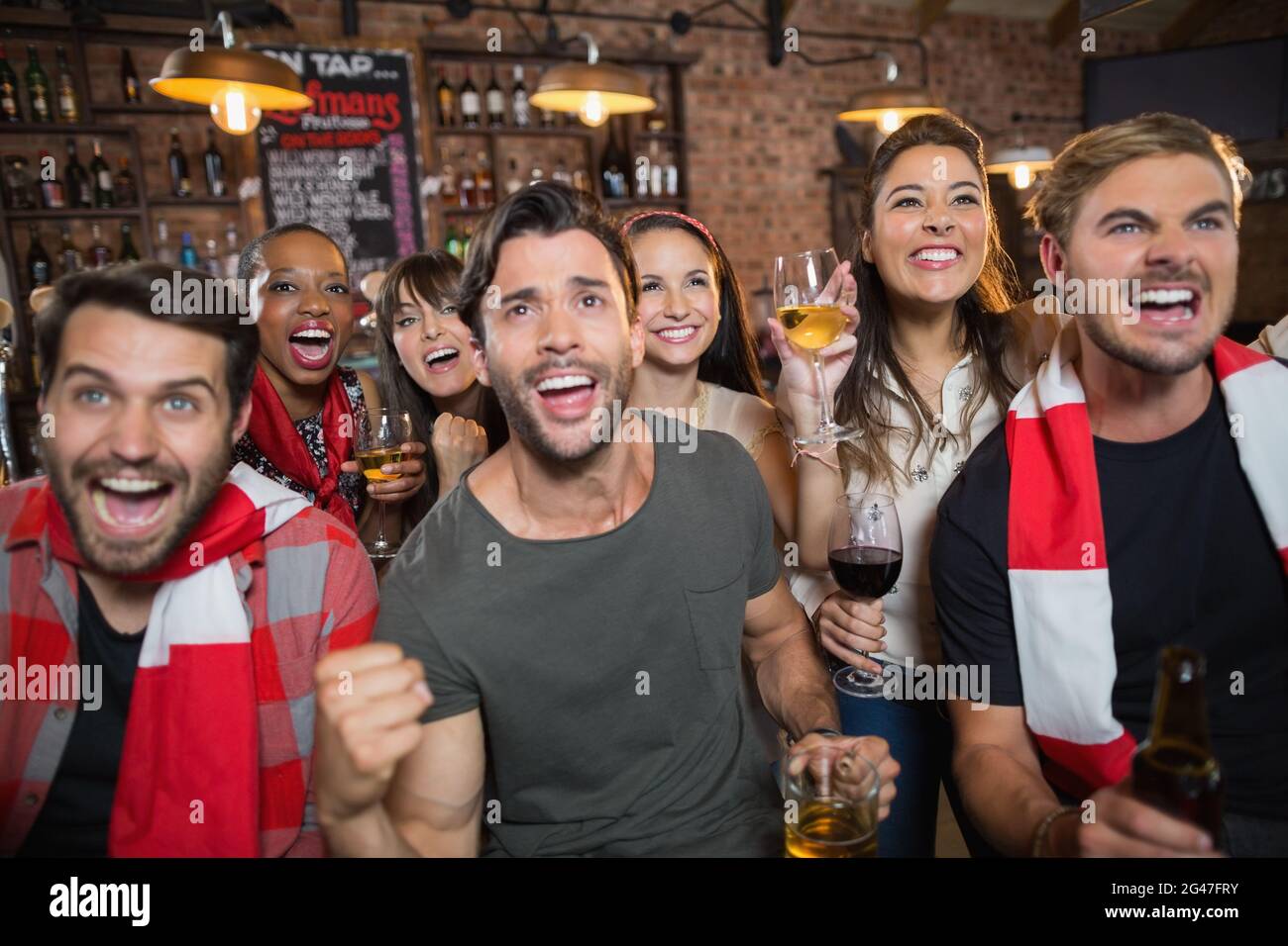 Group male friends having celebratory hi-res stock photography and ...