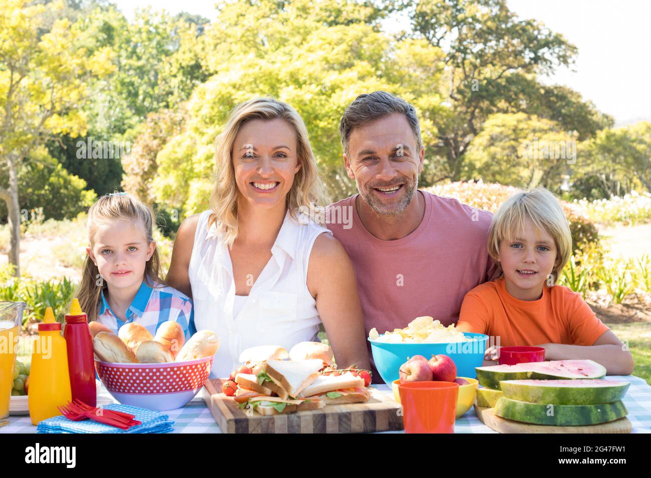 Happy family having meal hi-res stock photography and images - Alamy