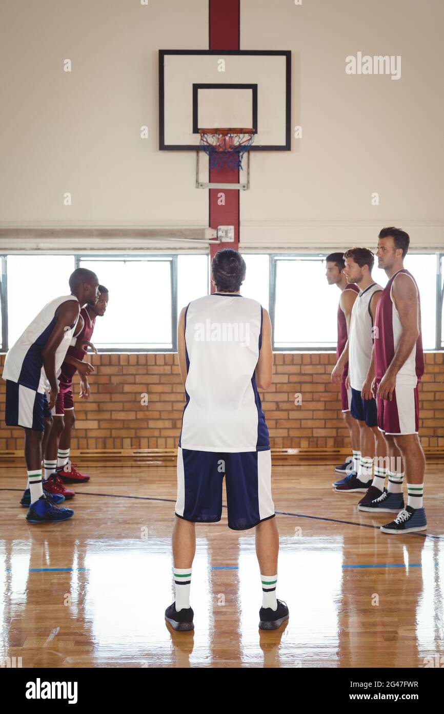 Basketball player about to take a penalty shot while playing basketball ...
