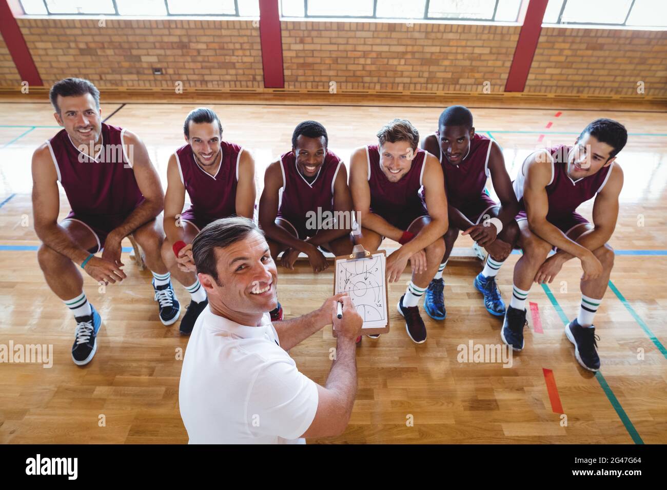 Basketball coach explaining game strategy hi-res stock photography and ...