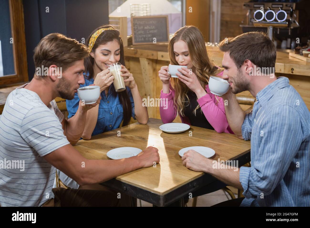 Four friends cafe having hi-res stock photography and images - Alamy