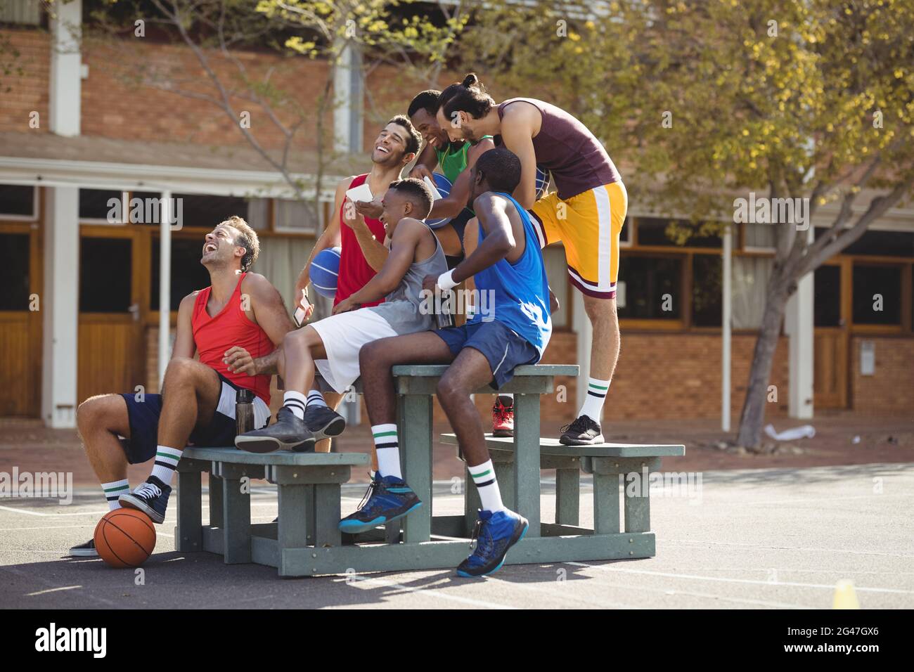 Basketball players taking a selfie Stock Photo - Alamy