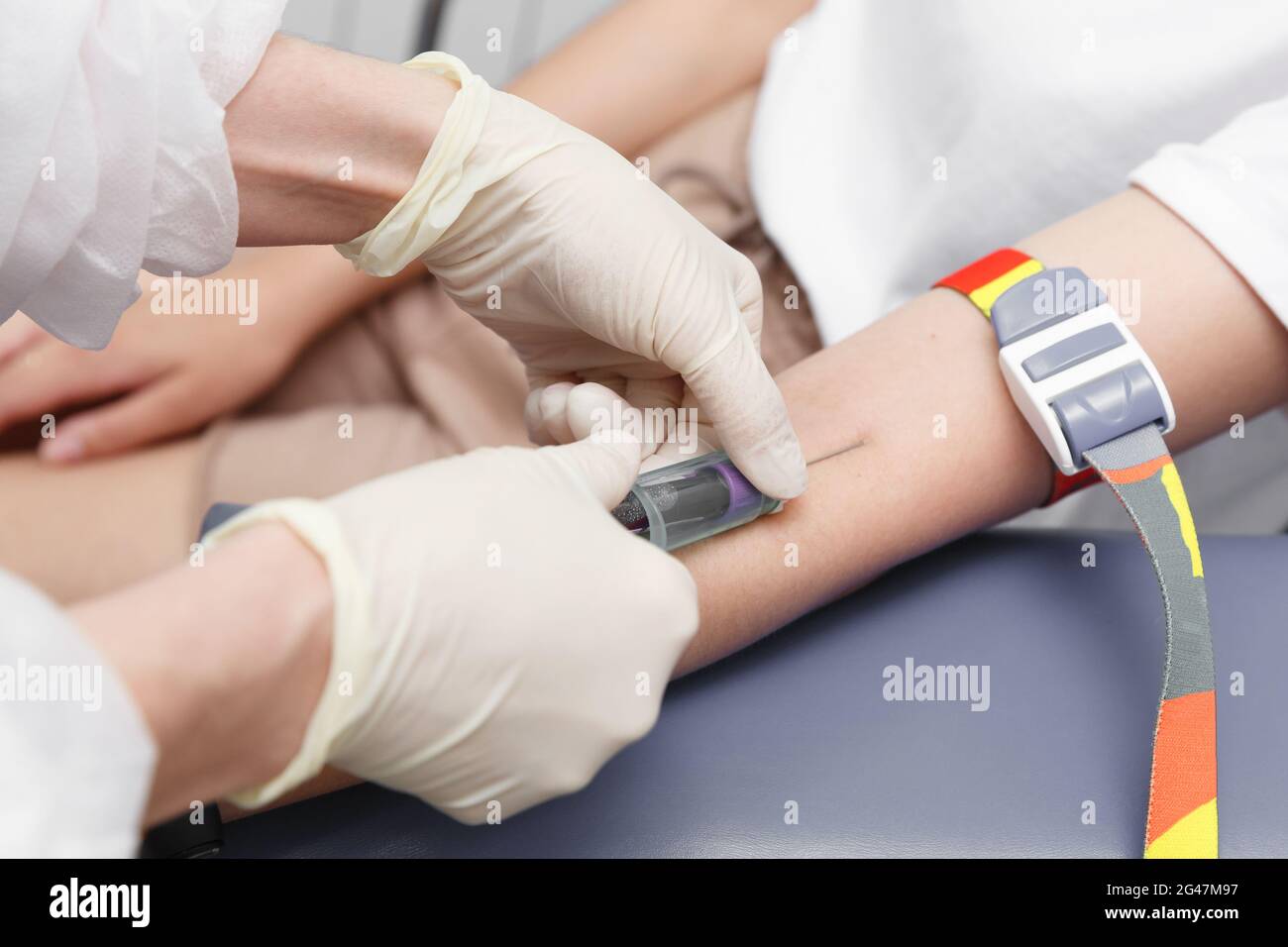 Close up view of blood test procedure in a laboratory. Health care ...