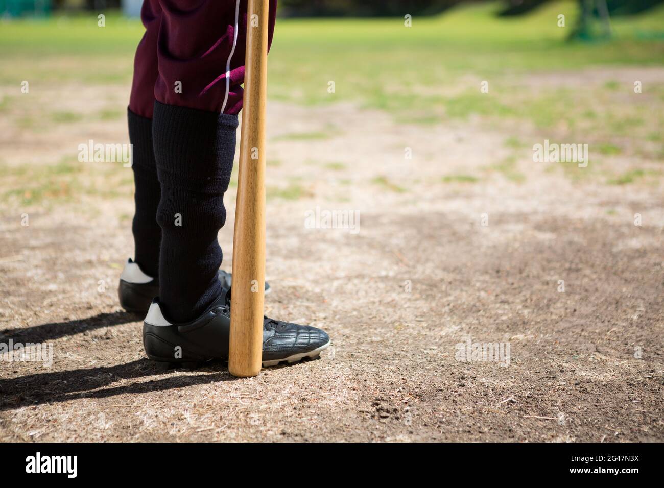Baseball bat baseball player standing holding sportswear hi-res stock ...