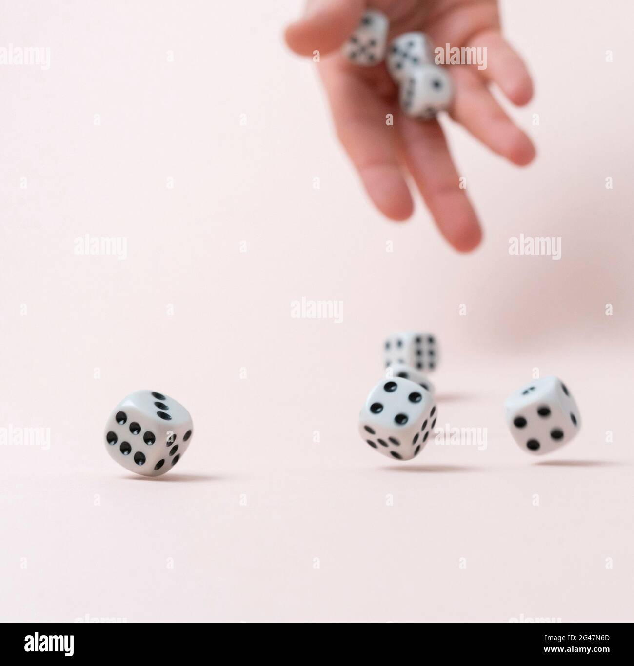 Number dice human hand hi-res stock photography and images - Alamy