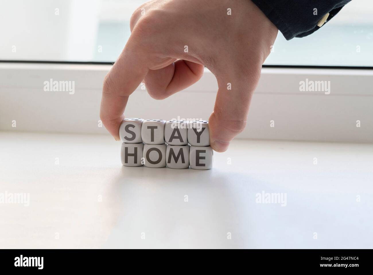stay safe at home during quarantine. dice cubes with text, simple ...