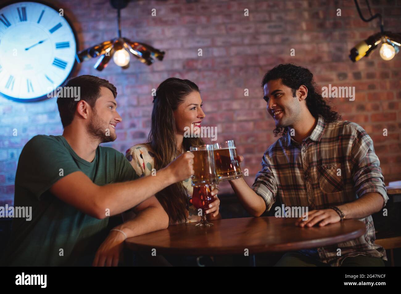 Toasting beer mugs hi-res stock photography and images - Alamy