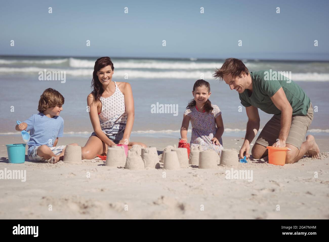 Children making sand castle hi-res stock photography and images - Alamy