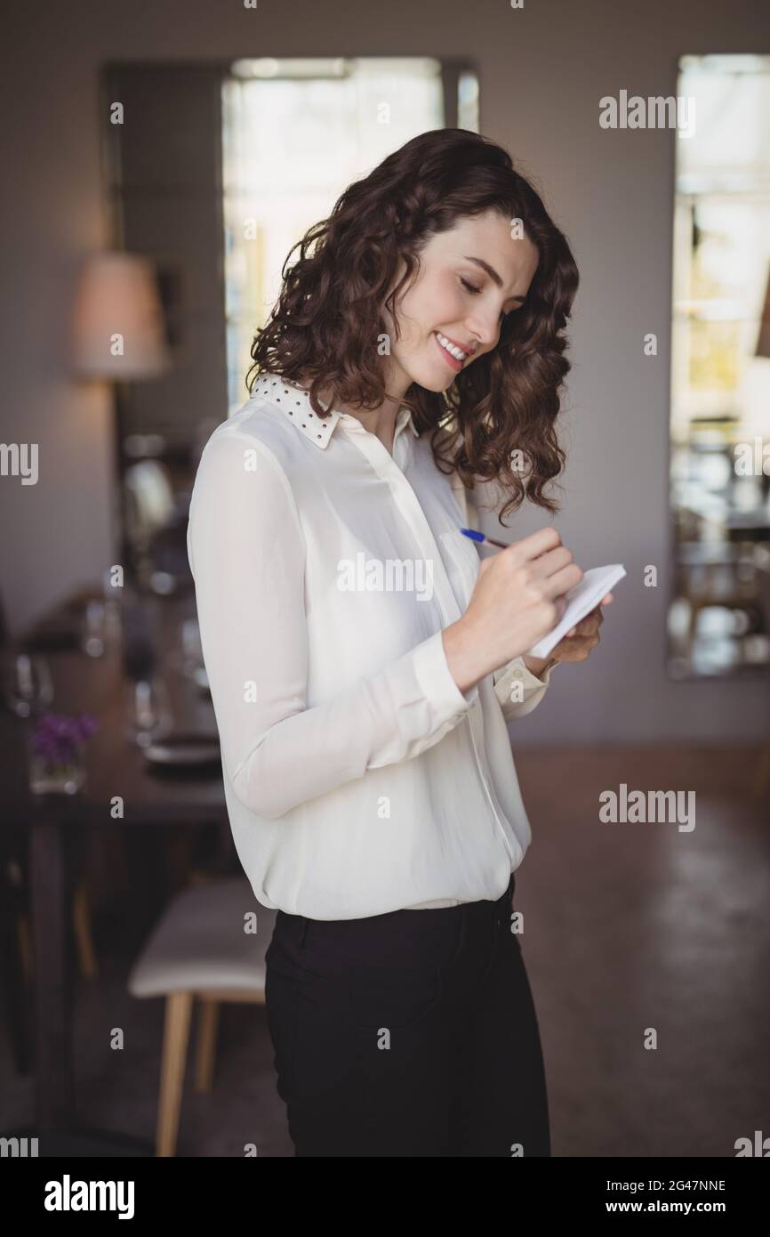 Waitress writing order on hi-res stock photography and images - Alamy