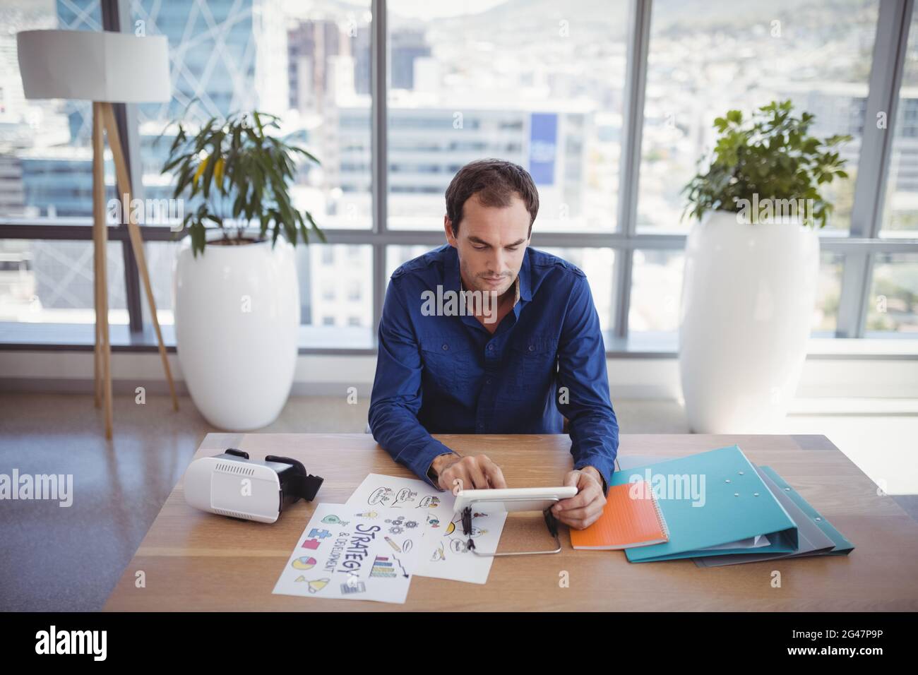 Attentive executive using digital hi-res stock photography and images ...