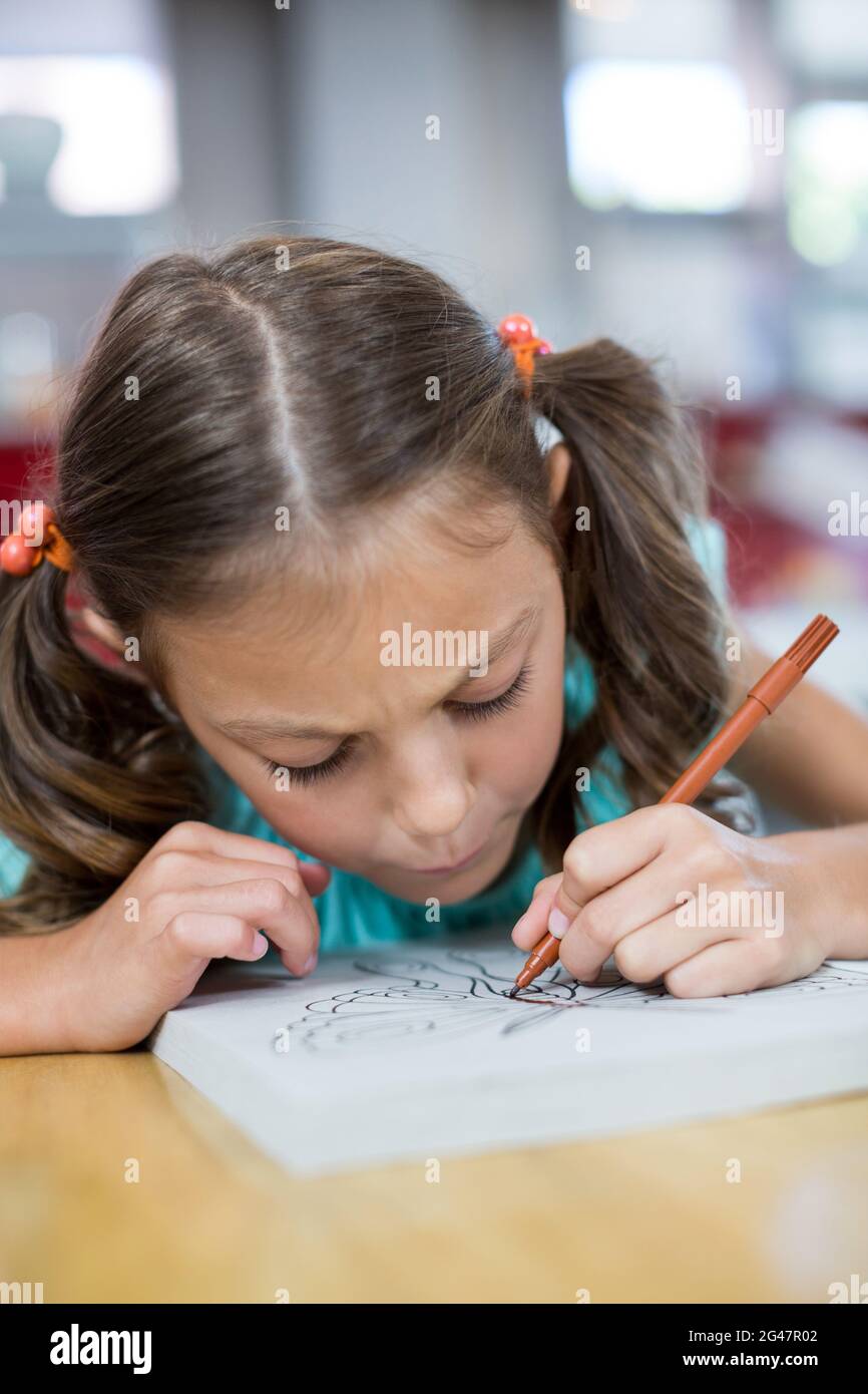 Girl drawing sketch on book Stock Photo - Alamy