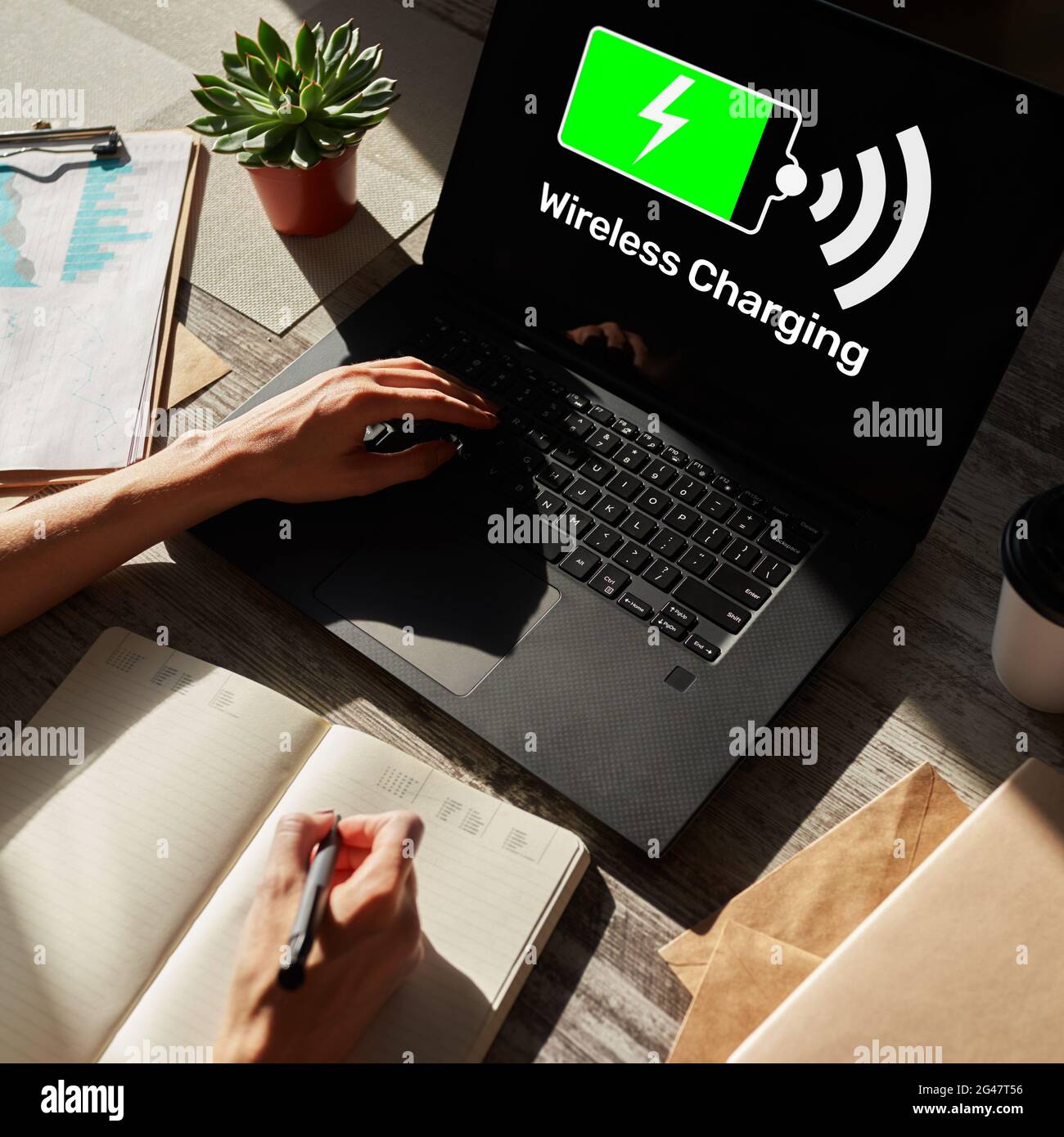Wireless charging icons and progress bar on device screen Stock Photo ...