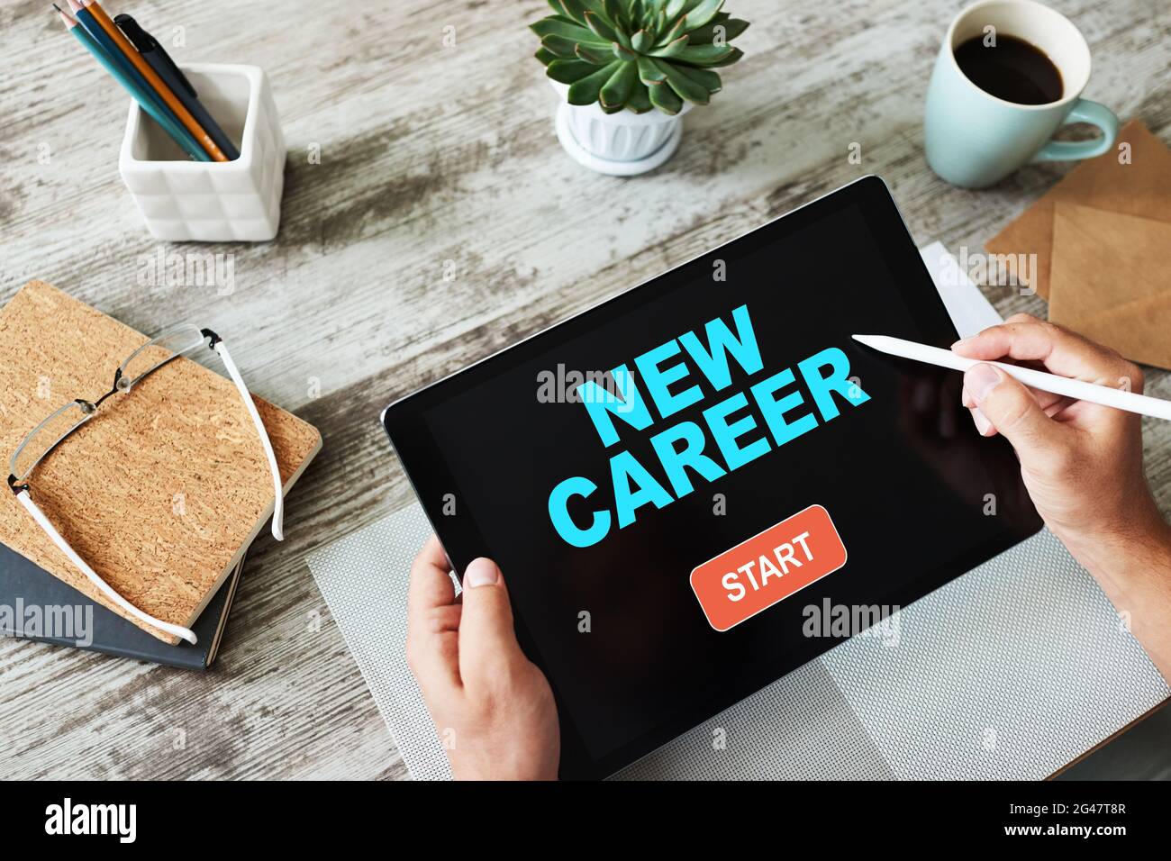 Start new career button on device screen. Recruitment and personal ...