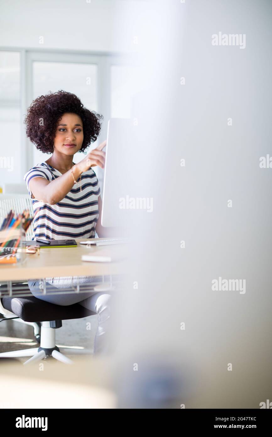 Female executive working at her desk Stock Photo - Alamy
