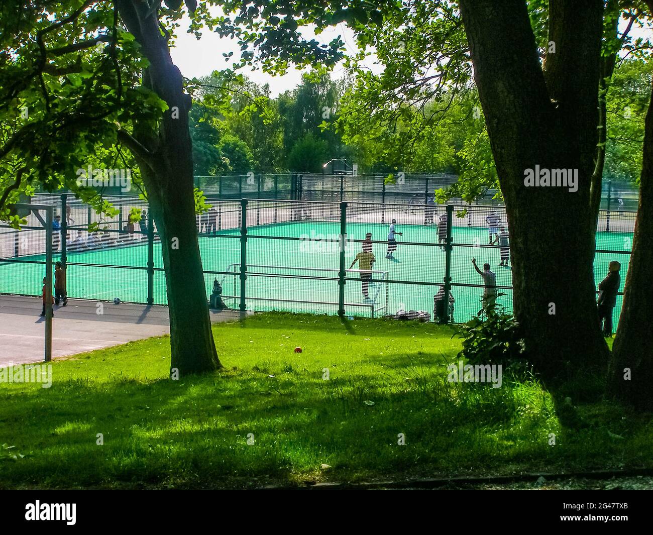 STOKE ON TRENT, ENGLAND – 3 MAY 2008: Men playing football in Hanley ...