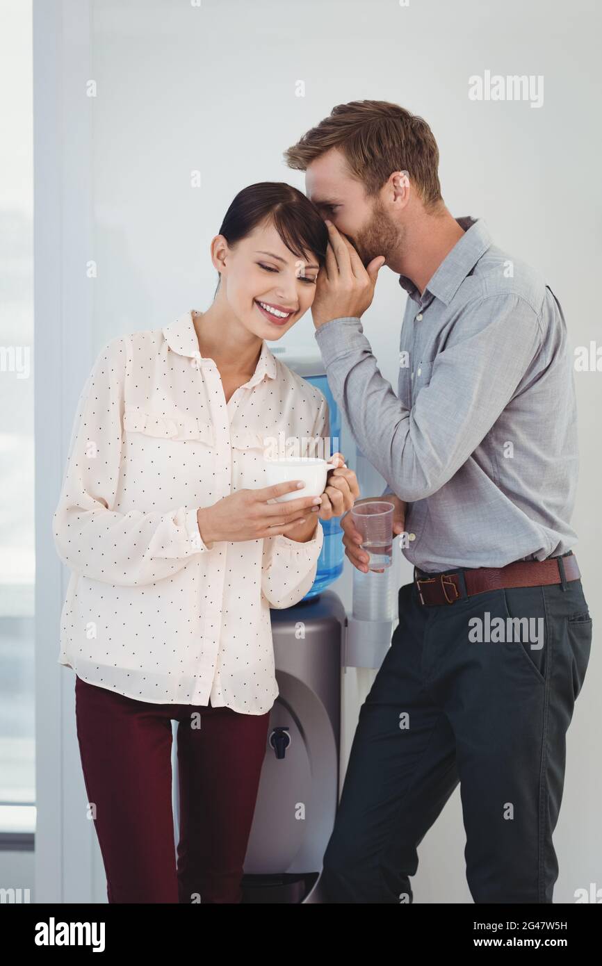 Man standing whispering hi-res stock photography and images - Alamy